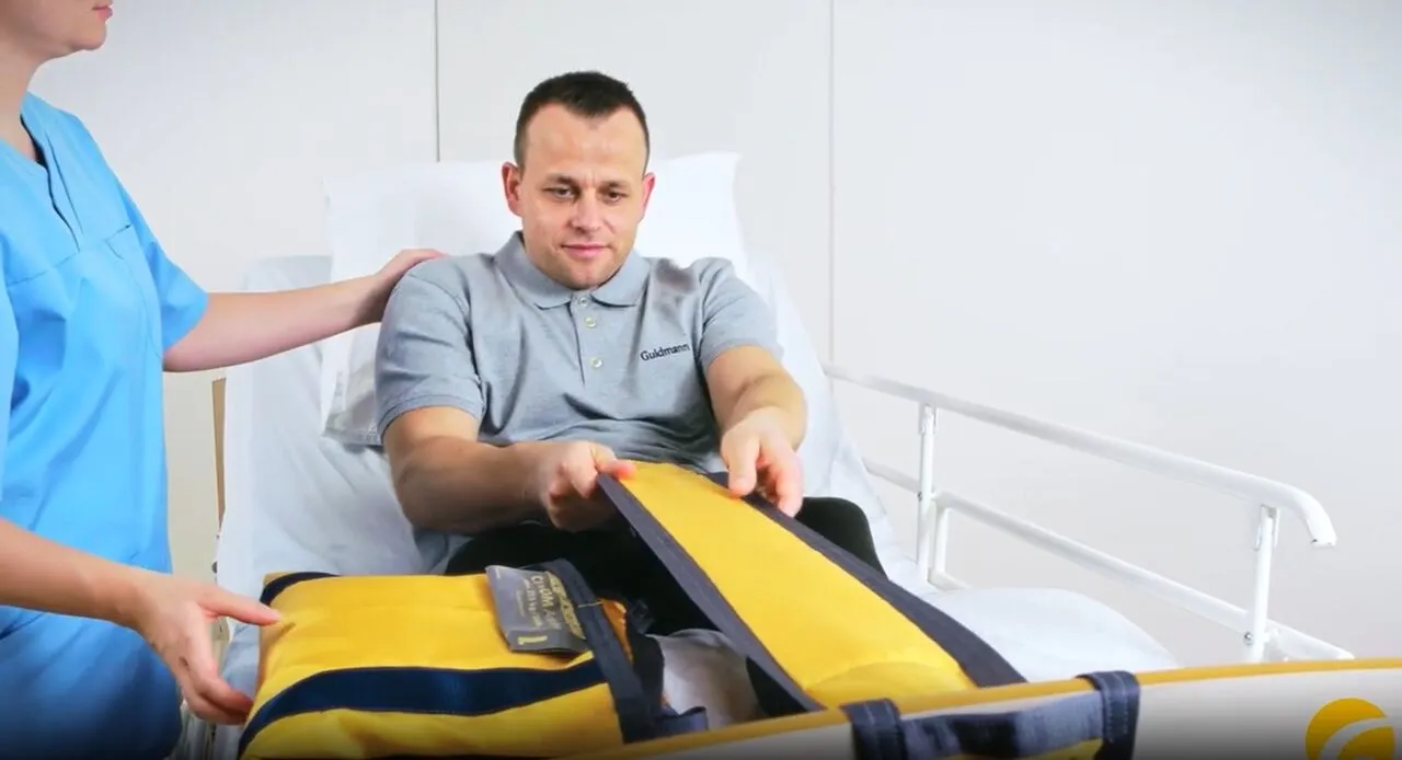 Sling for single- or double-leg amputees | Guldmann Inc.